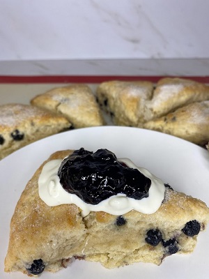 Cream Scones with Blueberries from: Eggs in a Casket novel by Laura ...